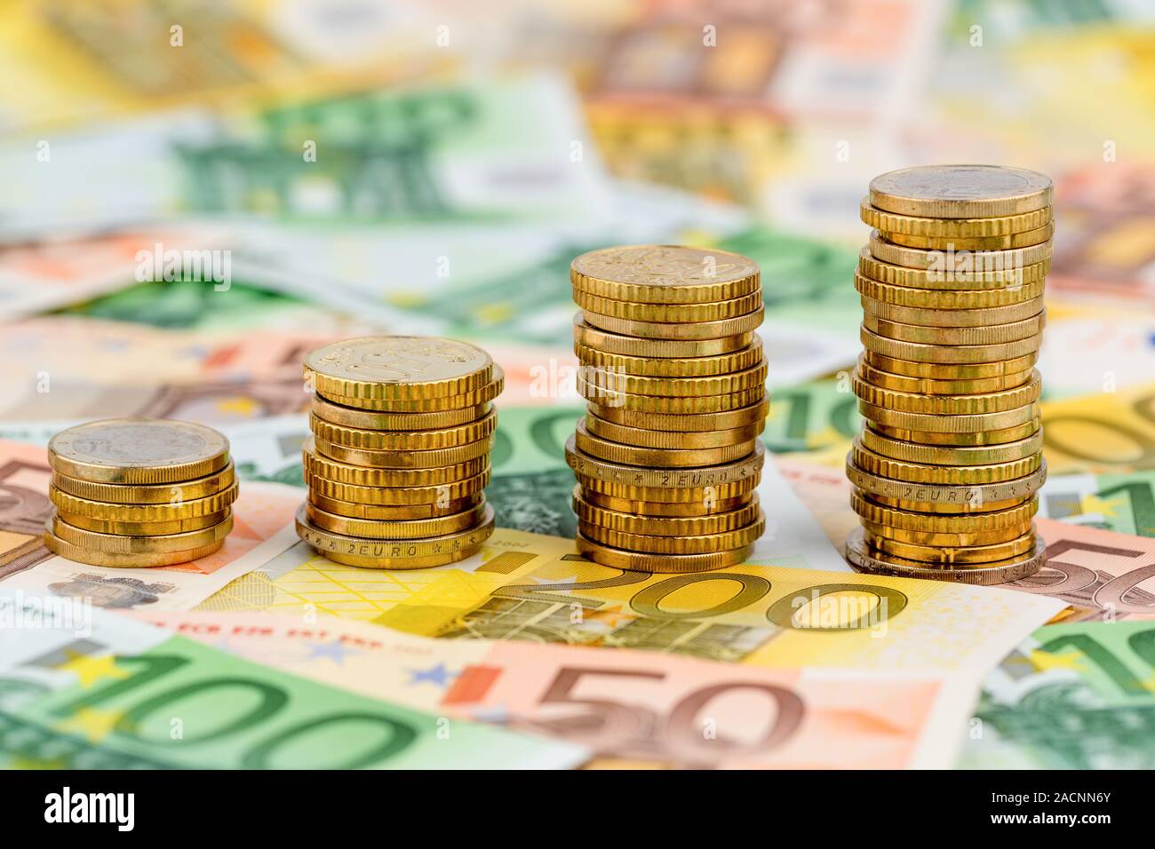 stack of money coins, rising curve Stock Photo - Alamy