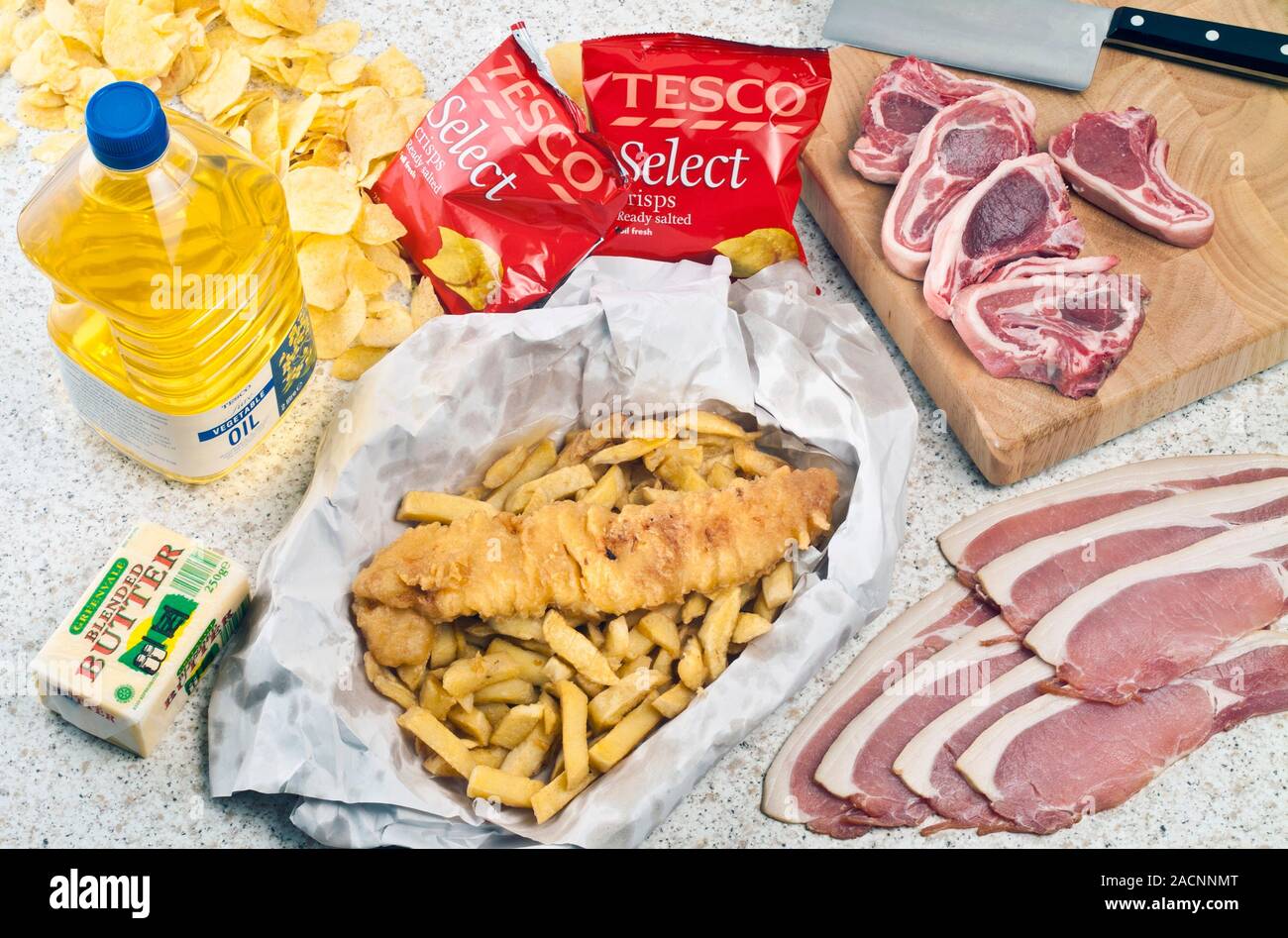 Assorted fatty foods. Selection of foods demonstrating the consumption ...