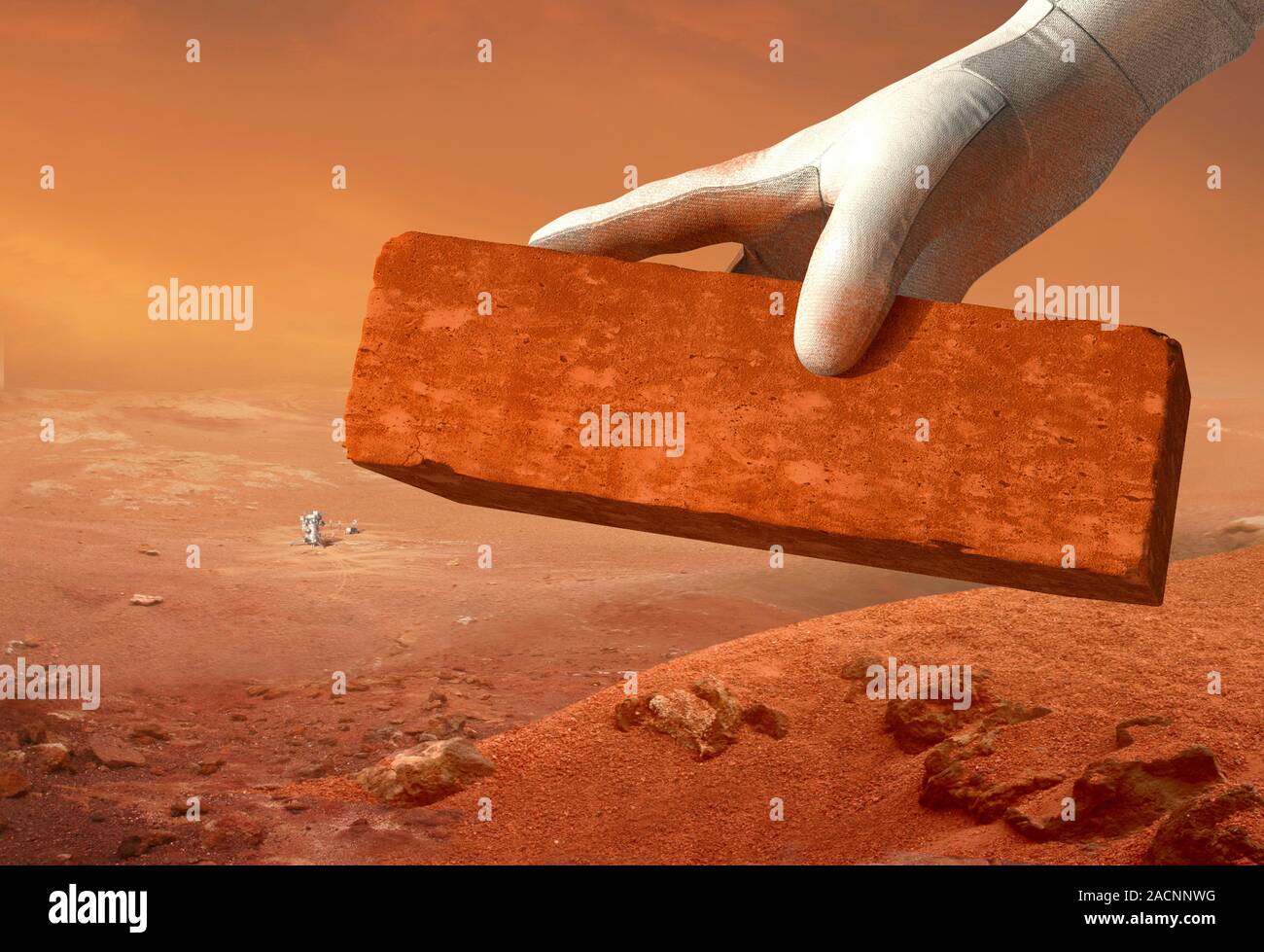 Martian settlement. Computer artwork of a person holding a brick made ...
