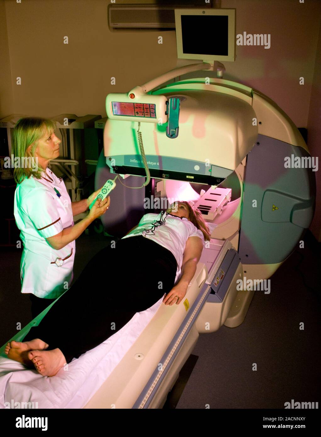 Medical imaging in lung disease research. Radiologist preparing a gamma ...
