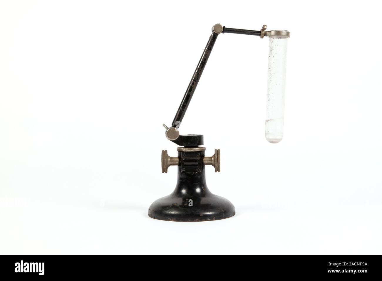 1920s test-tube stand. Test-tube being held in a 1920s iron stand Stock ...