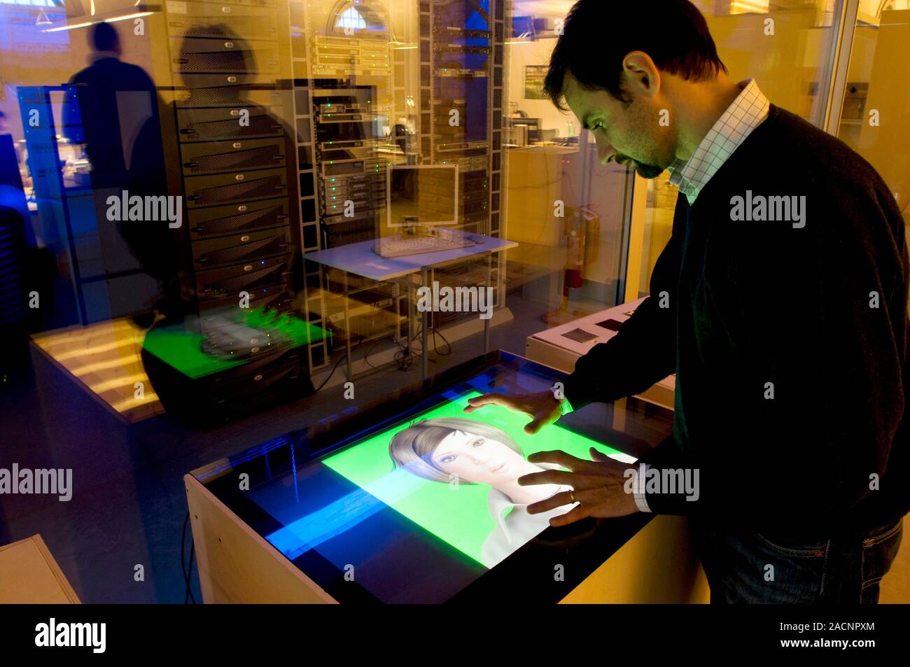 3D virtual avatar construction. Man using a computer program and ...