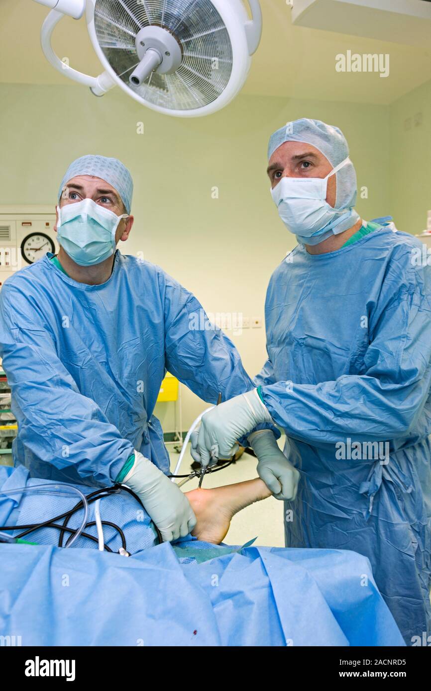 Ankle arthroscopy. Orthopaedic surgeons using keyhole arthroscopy ...