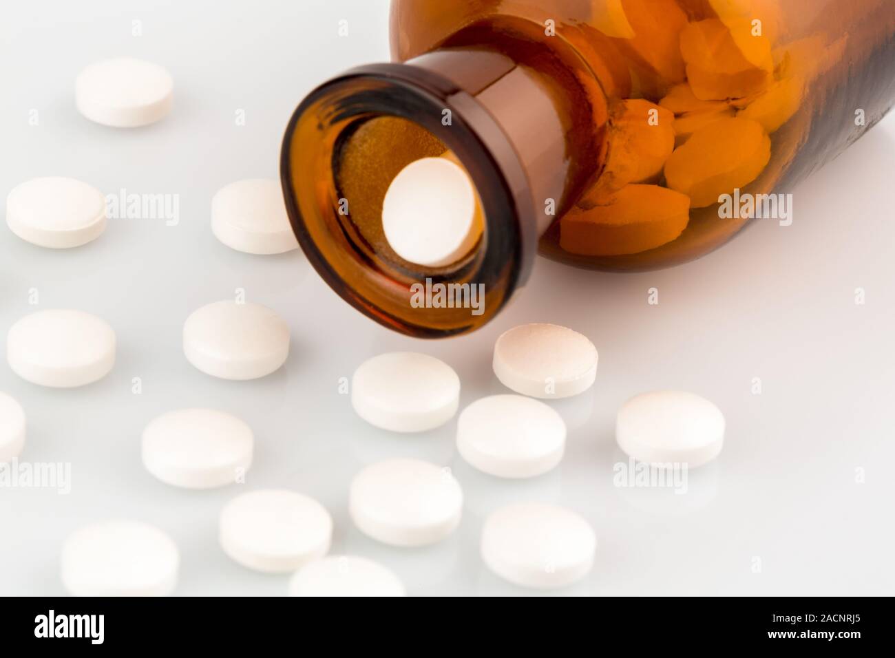 Many tablets with container Stock Photo - Alamy