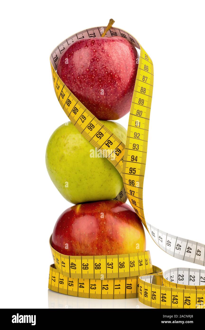 Apples on with tape measure Stock Photo - Alamy