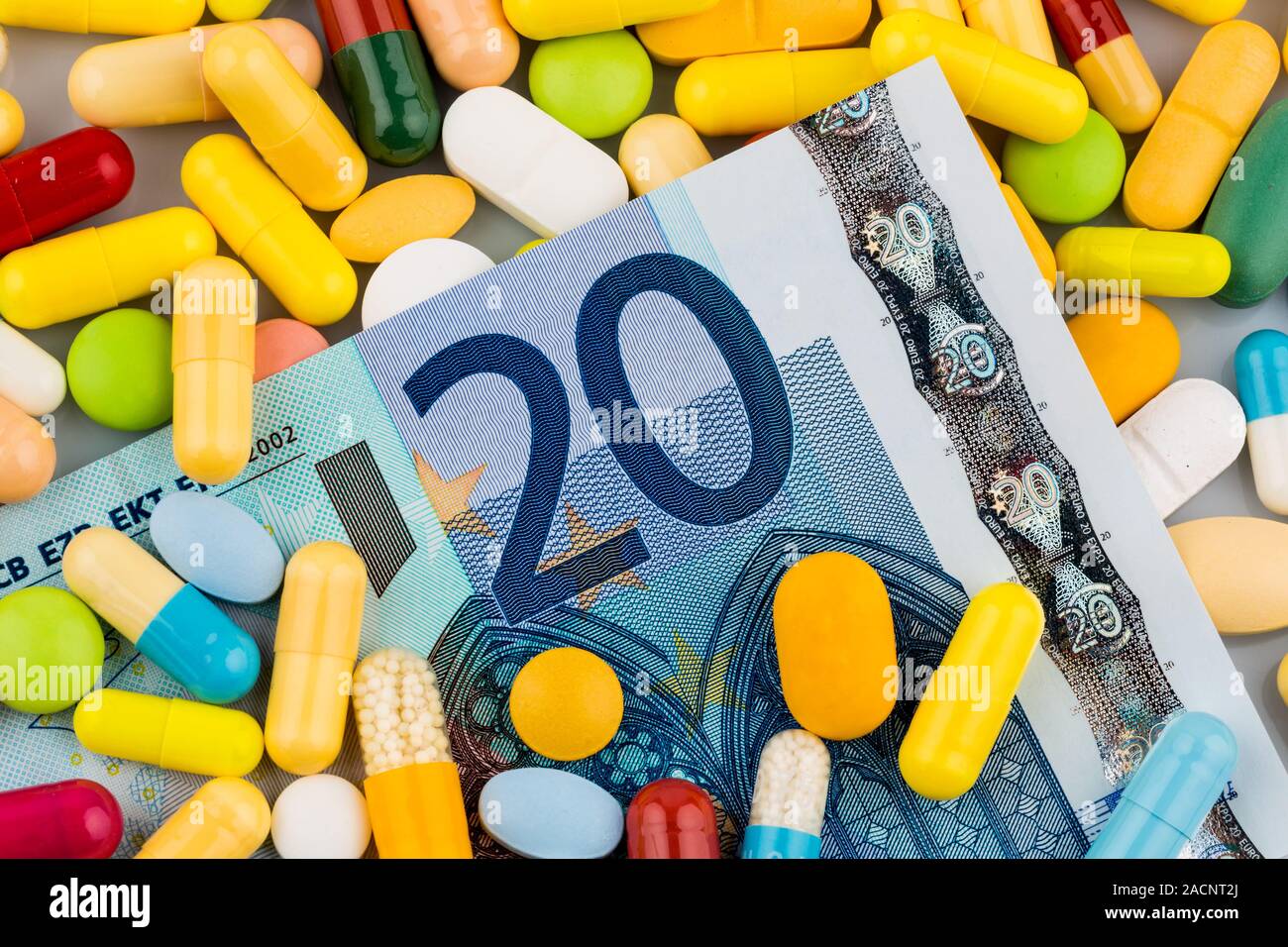 Euro banknotes and tablets Stock Photo - Alamy