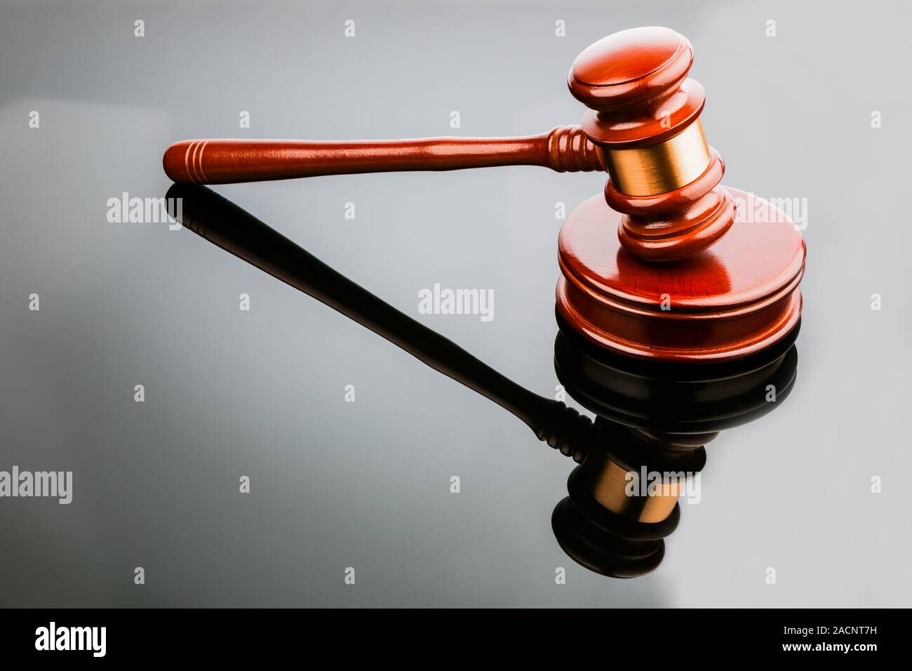 Auction hammer reflects itself Stock Photo - Alamy