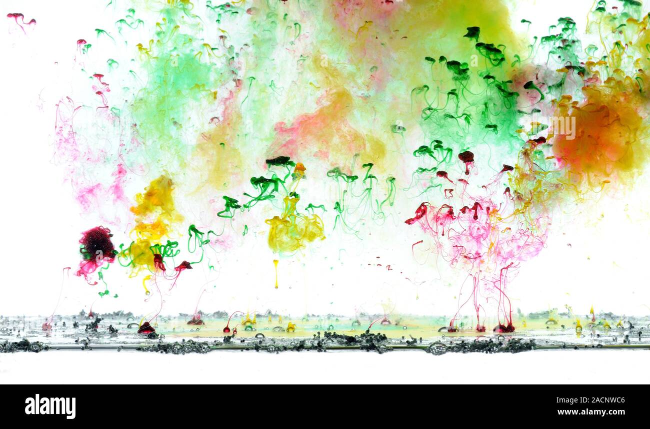 Coloured inks in water, high-speed image Stock Photo - Alamy