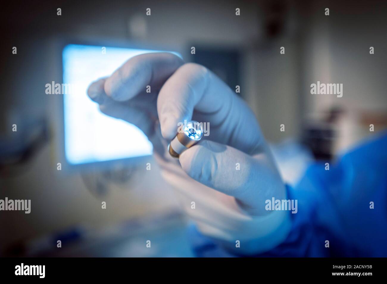 Capsule endoscopy. Doctor holding a capsule endoscope. This pill-shaped ...