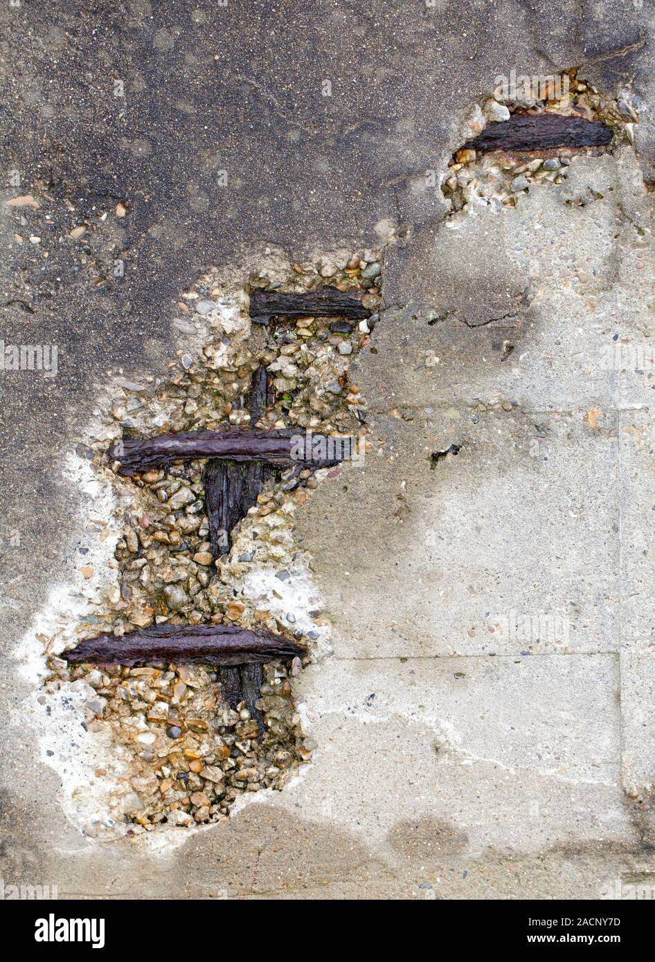 Water damaged concrete. Close-up of a steel reinforced concrete ...