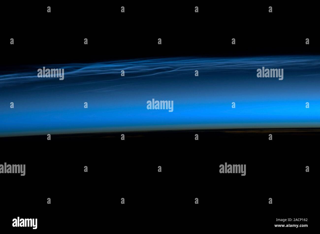 Polar mesospheric clouds, ISS image. Photograph of polar mesospheric ...