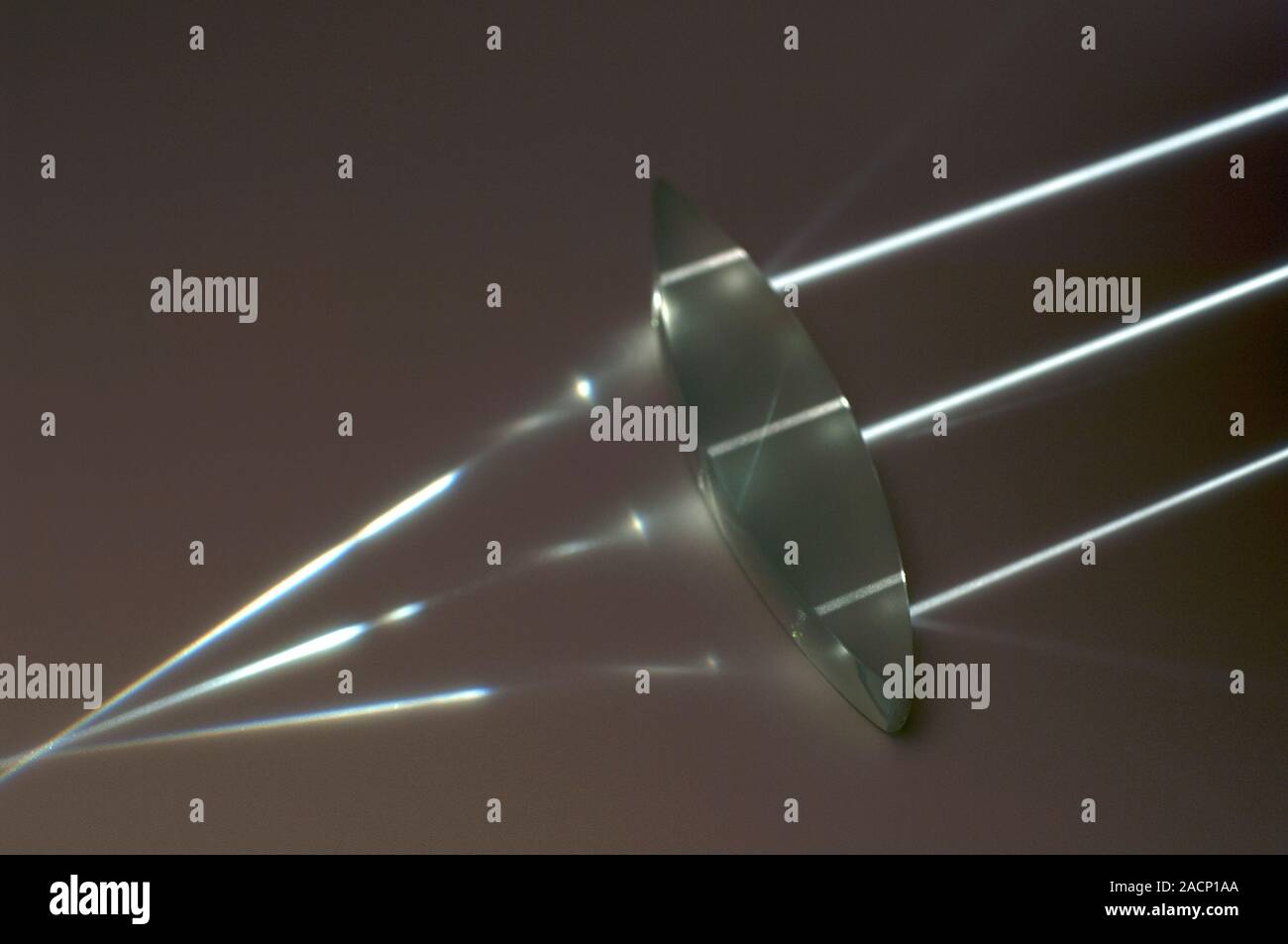 Light rays and convex prism. As light rays pass between transparent ...