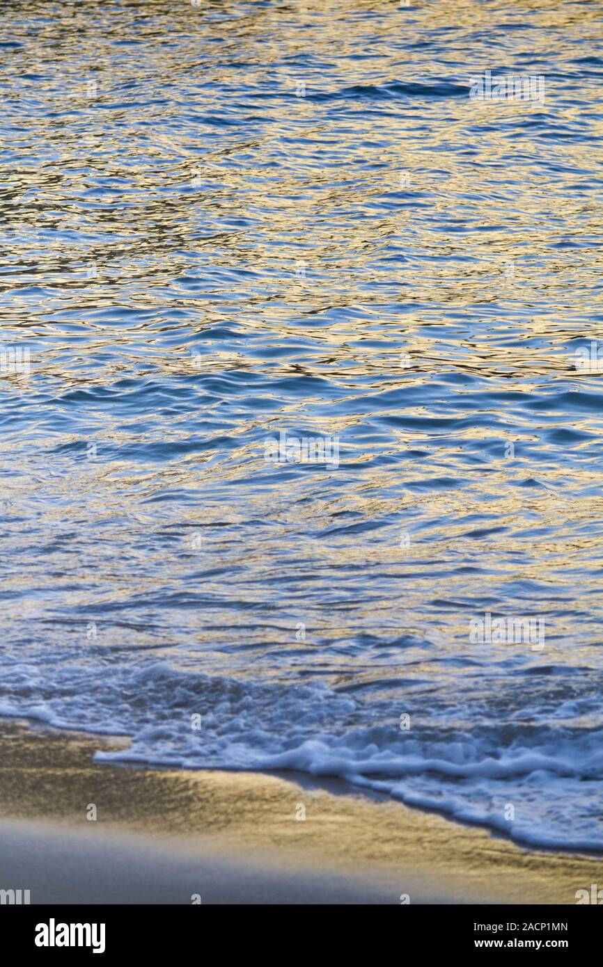 golden ocean water Stock Photo - Alamy