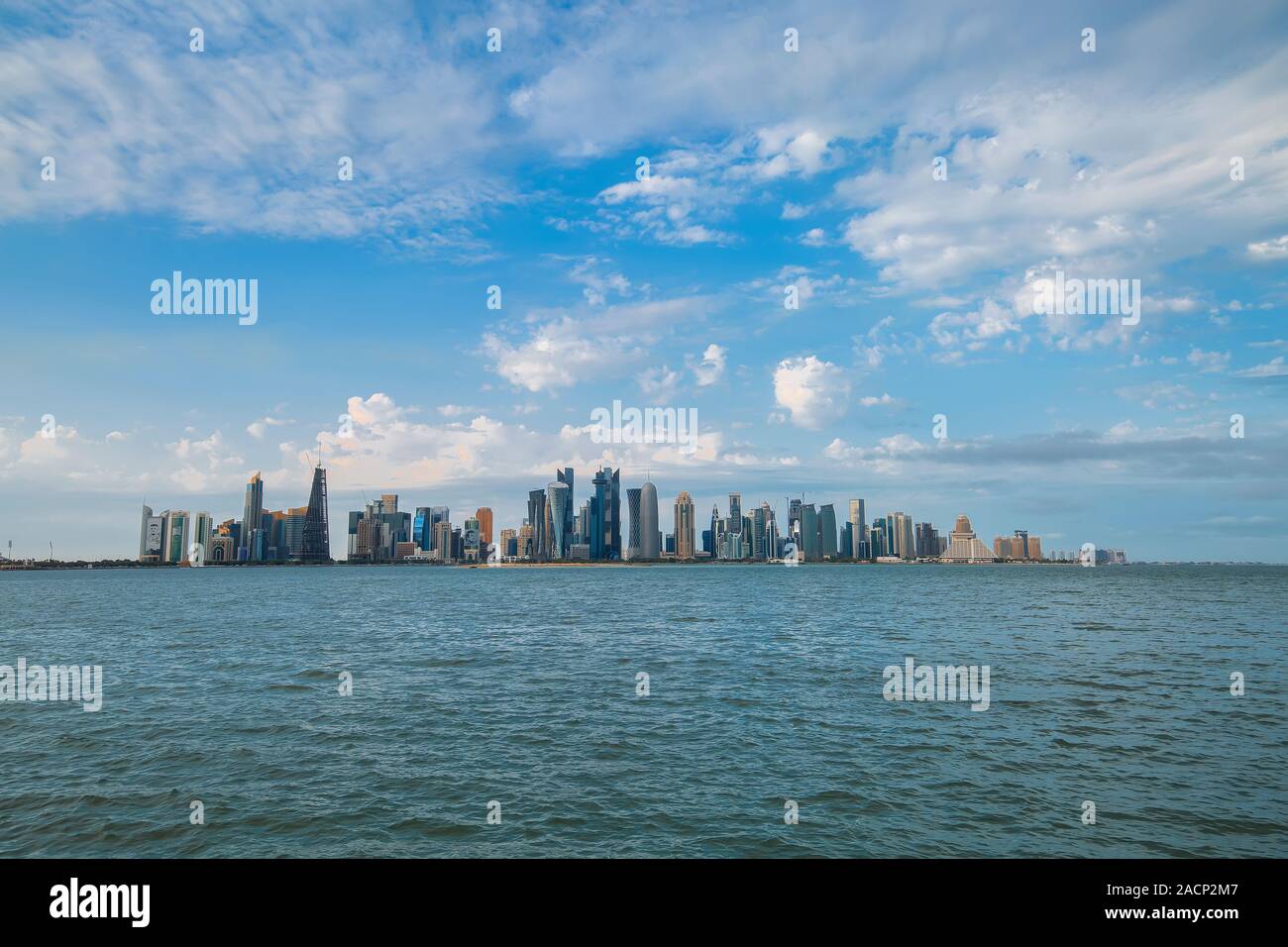 Doha Skyline after rain cloudy sky Stock Photo - Alamy