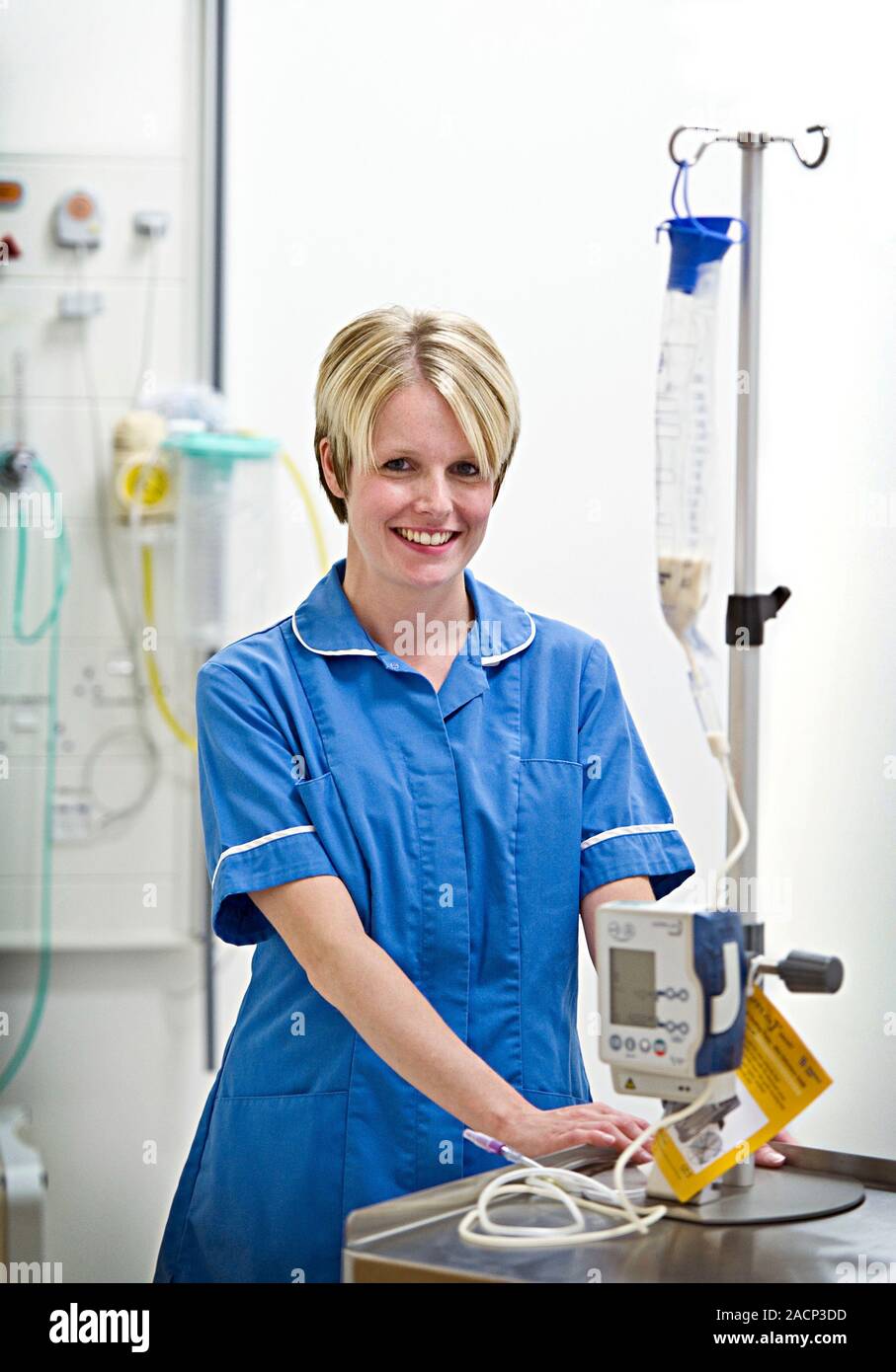 Hospital nurse with an intravenous infusion machine Stock Photo - Alamy