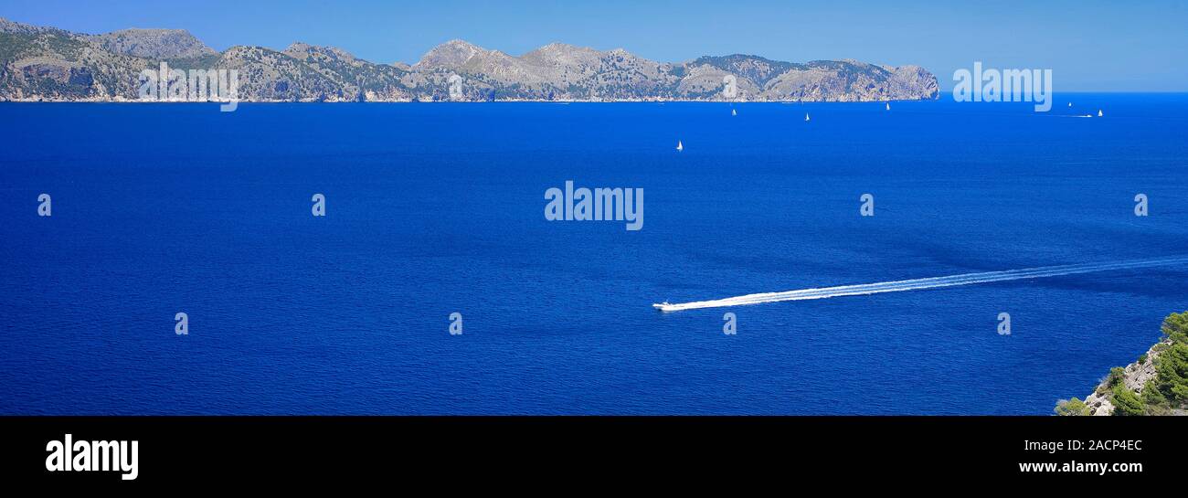 View over the sandy beach at Bay de Pollensa, Cap de Formentor ...