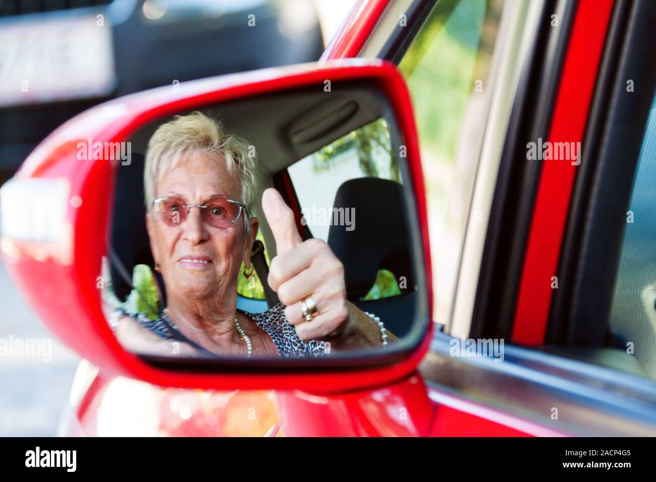 Senior driver in the car Stock Photo - Alamy