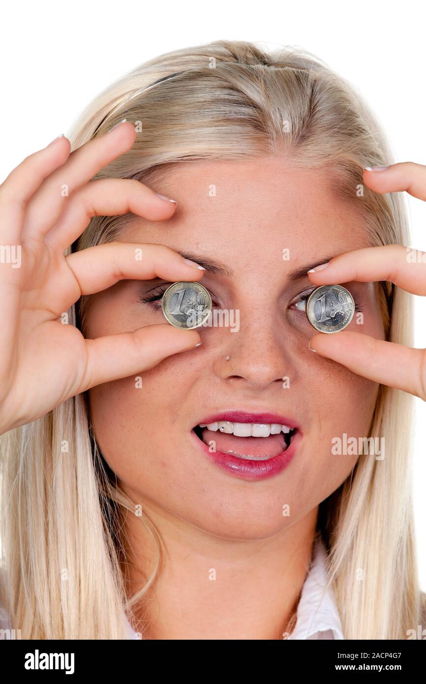 Woman with Euro money coins in front of her eyes Stock Photo - Alamy