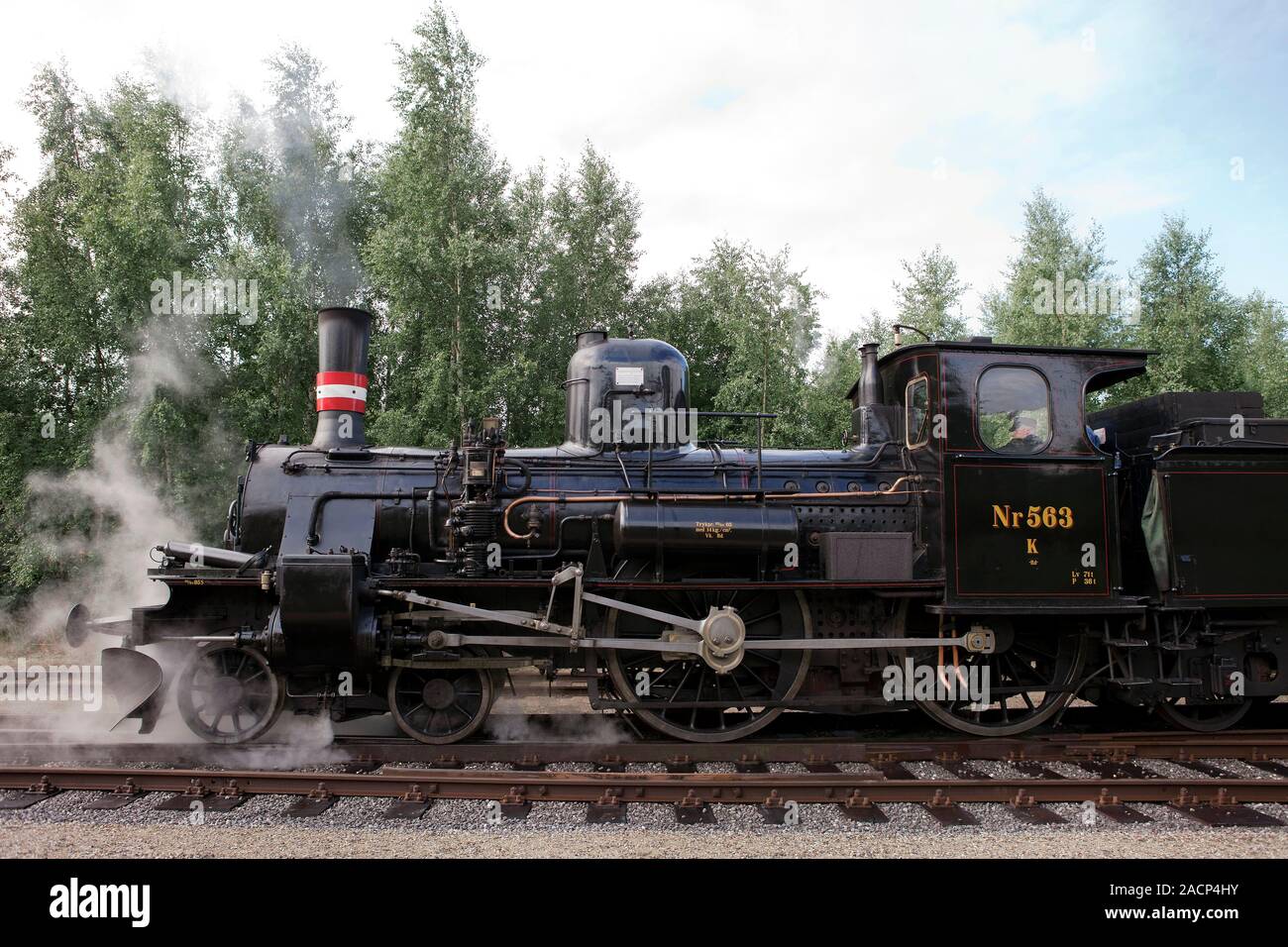 Steam locomotive. Museum volunteer driving steam locomotive K563. Built ...