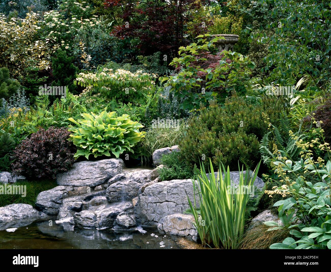 Garden water feature Stock Photo - Alamy