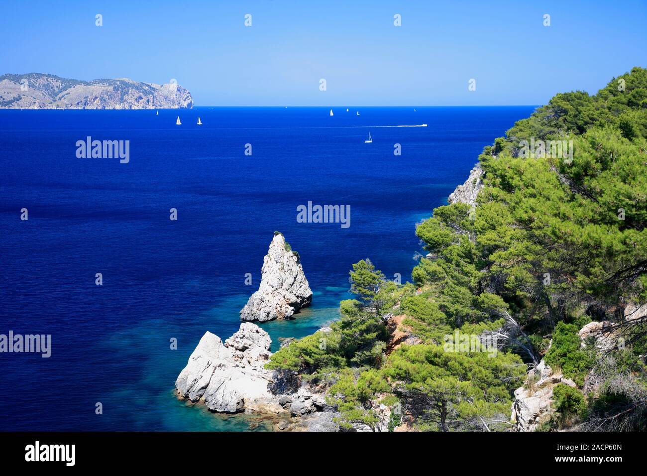 View over the sandy beach at Bay de Pollensa, Cap de Formentor ...