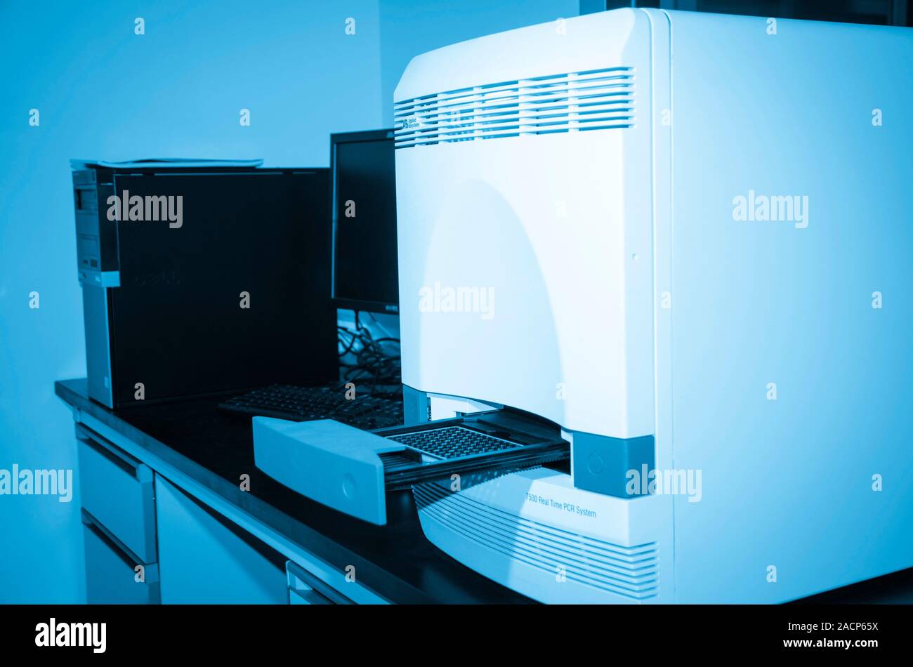 Real-time PCR (polymerase chain reaction) machine in a laboratory. The ...