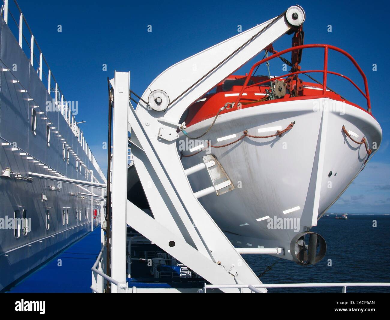 Shipboard lifeboat. This lifeboat has reflective tape on its hull ...