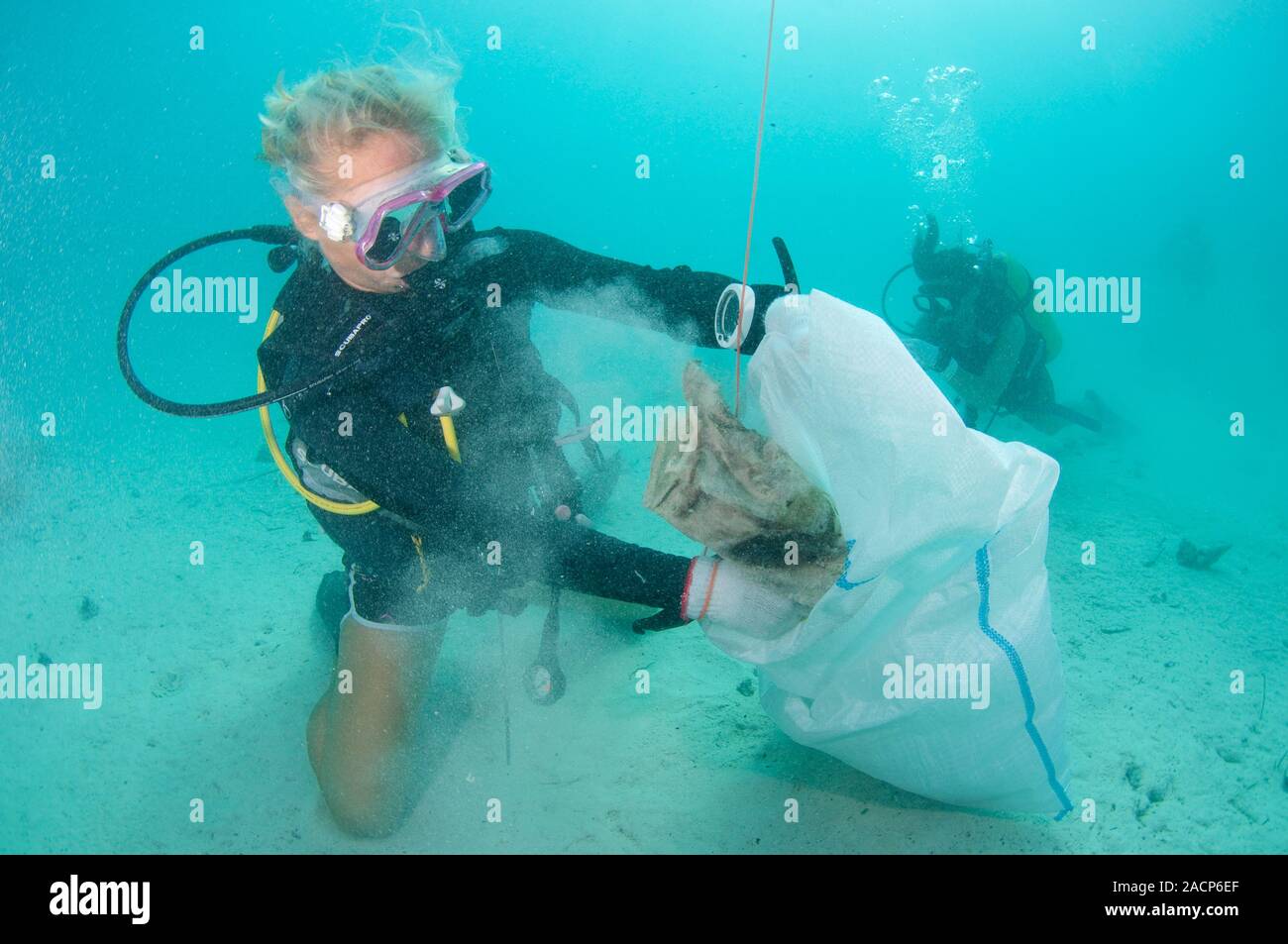 A scuba diver taking part in an underwater clean up at Rasdhoo Atoll ...