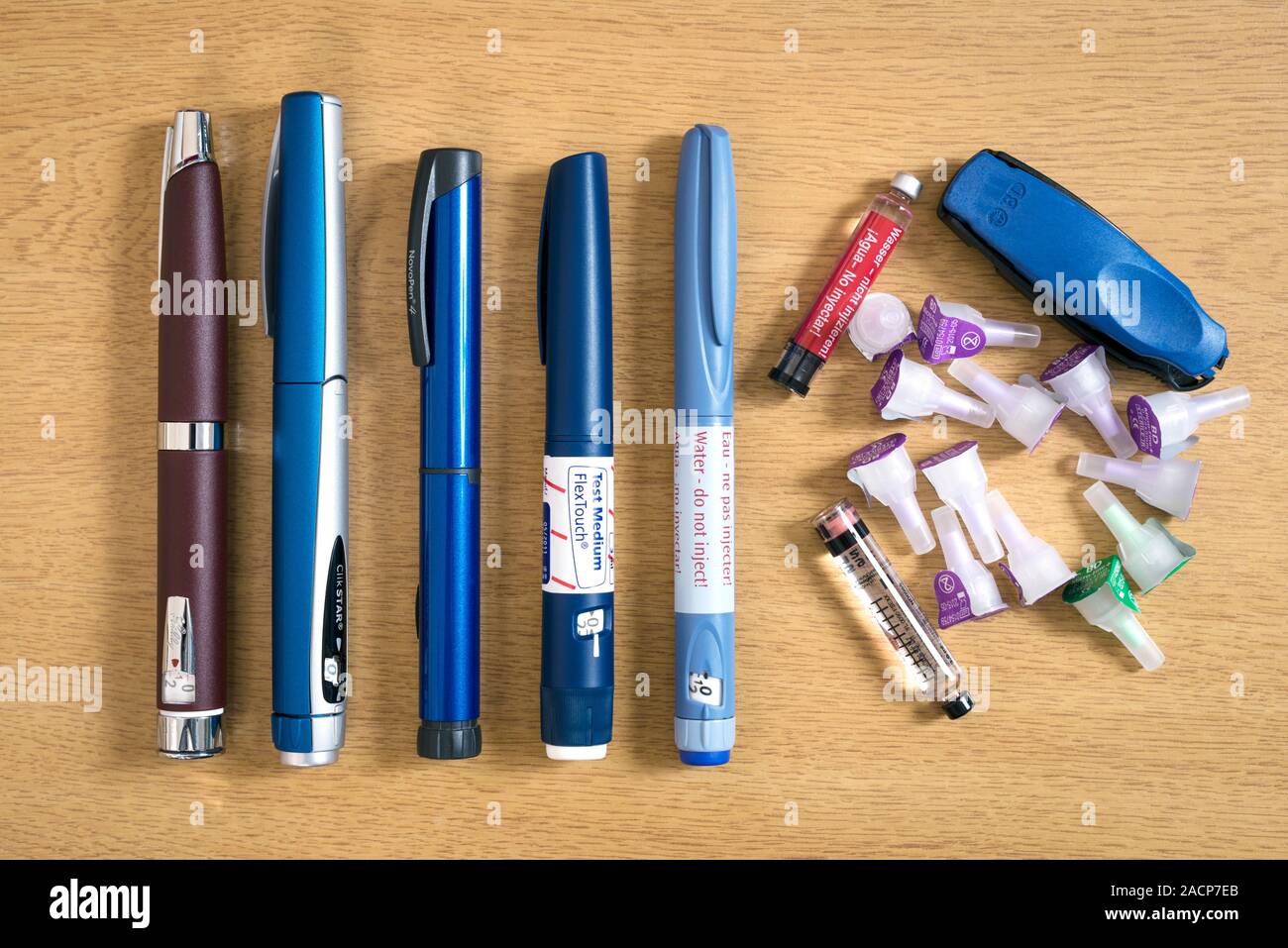 Diabetes insulin pens and equipment. Range of diabetes pens (left) for ...