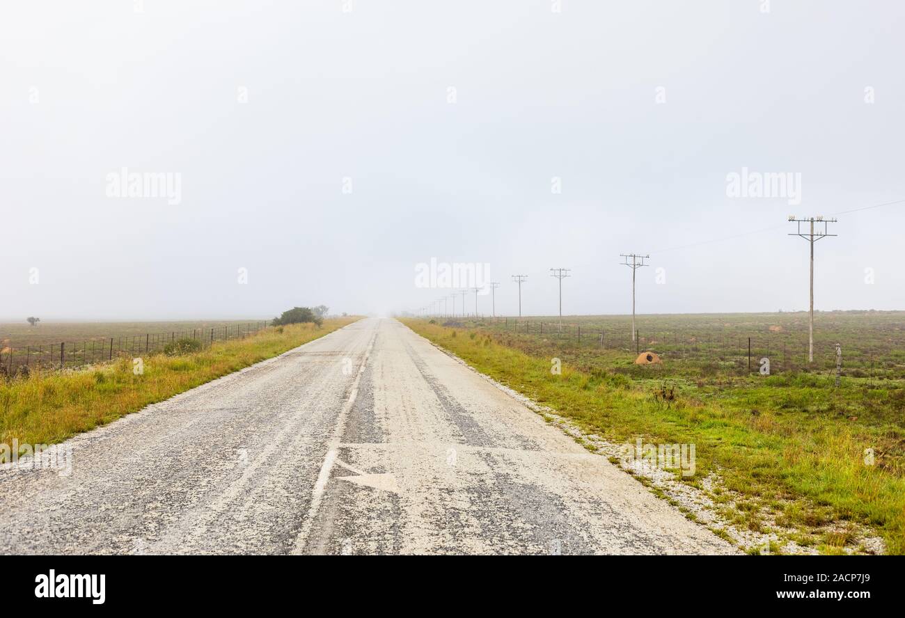 View of an empty country highway road in South African Farmland region ...