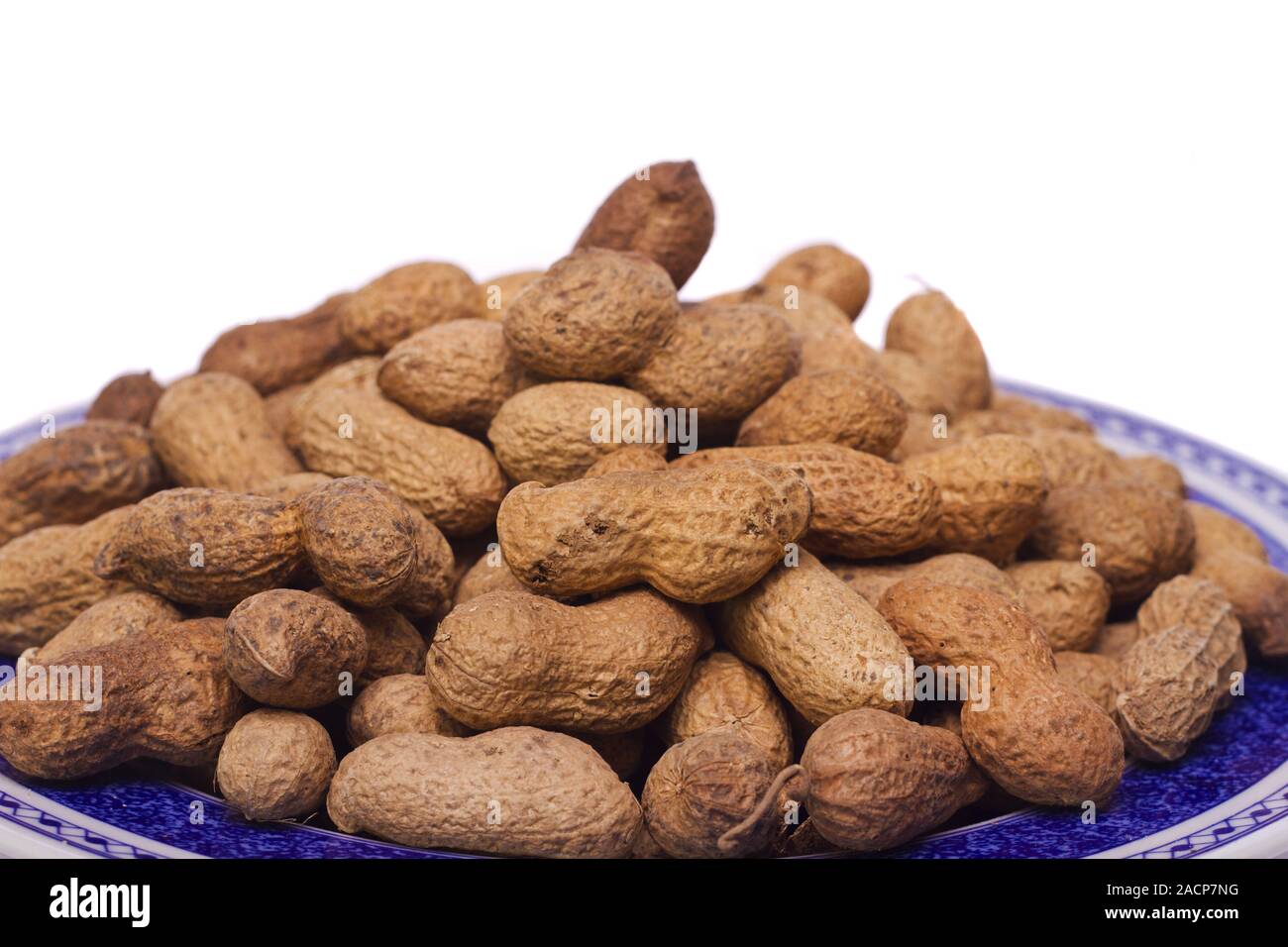 peanuts on white Stock Photo - Alamy