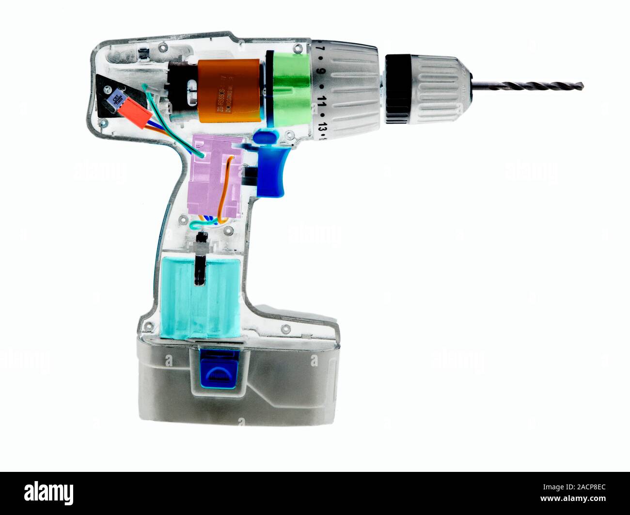 Interior of a cordless drill showing the layout of the major components ...