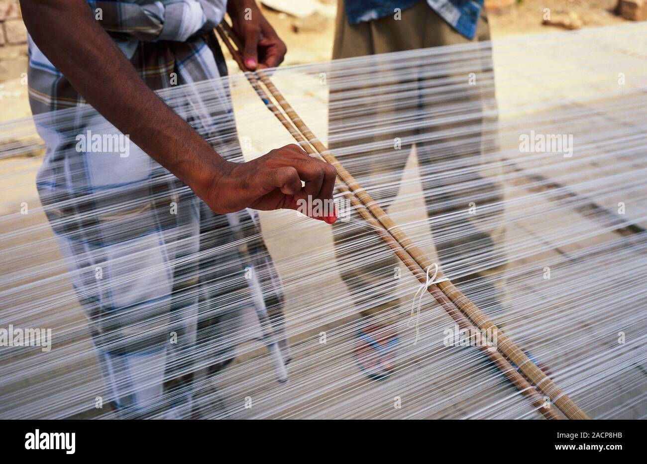 Sari weaving. Muslim master weaver making a sari. Photographed in ...