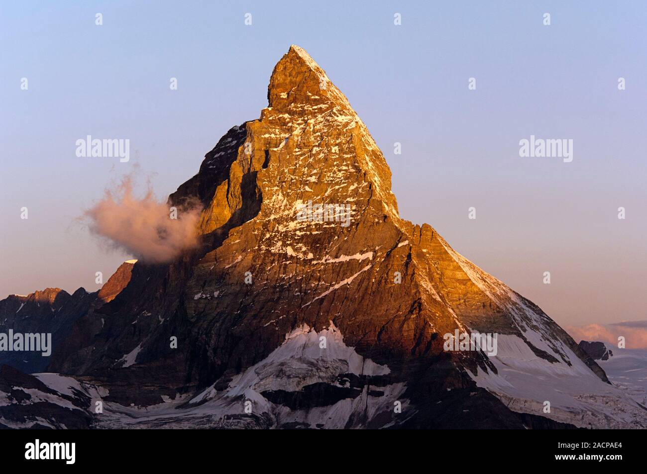 Matterhorn at dawn. View of the east face and Hornli Ridge of the ...