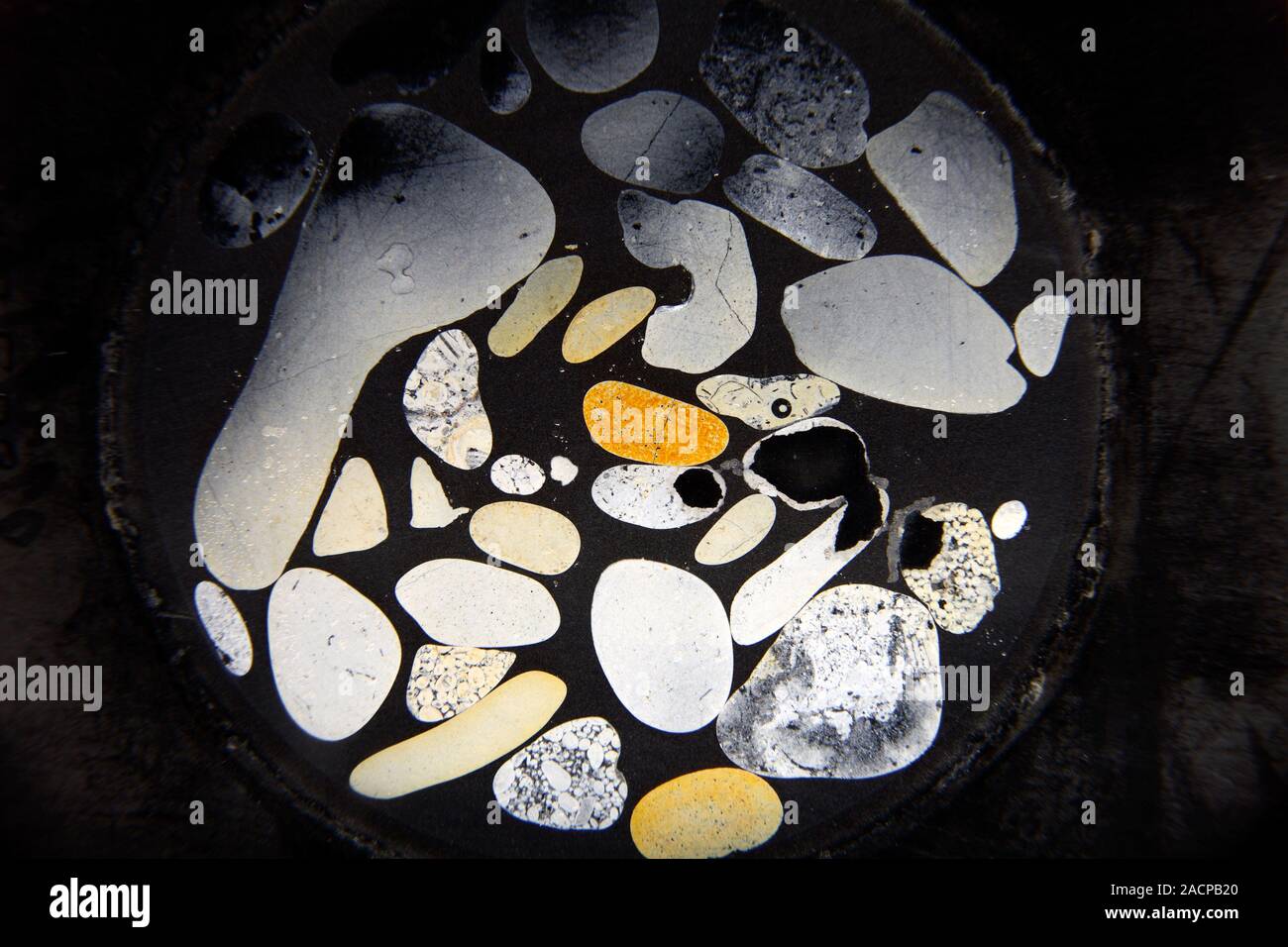 Granulate rock aggregates. Light micrograph of a polished section ...