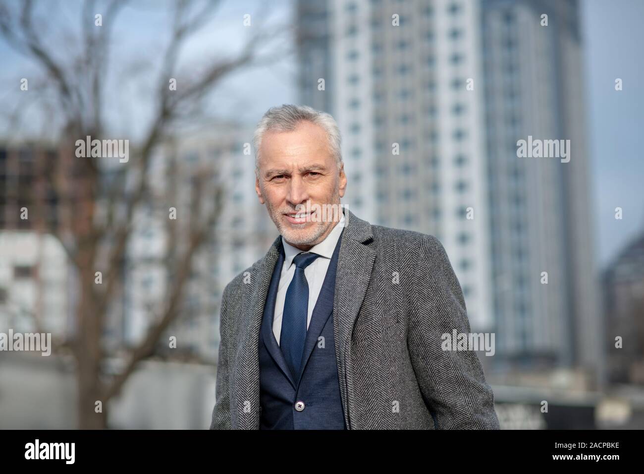 Grey coat hi-res stock photography and images - Alamy