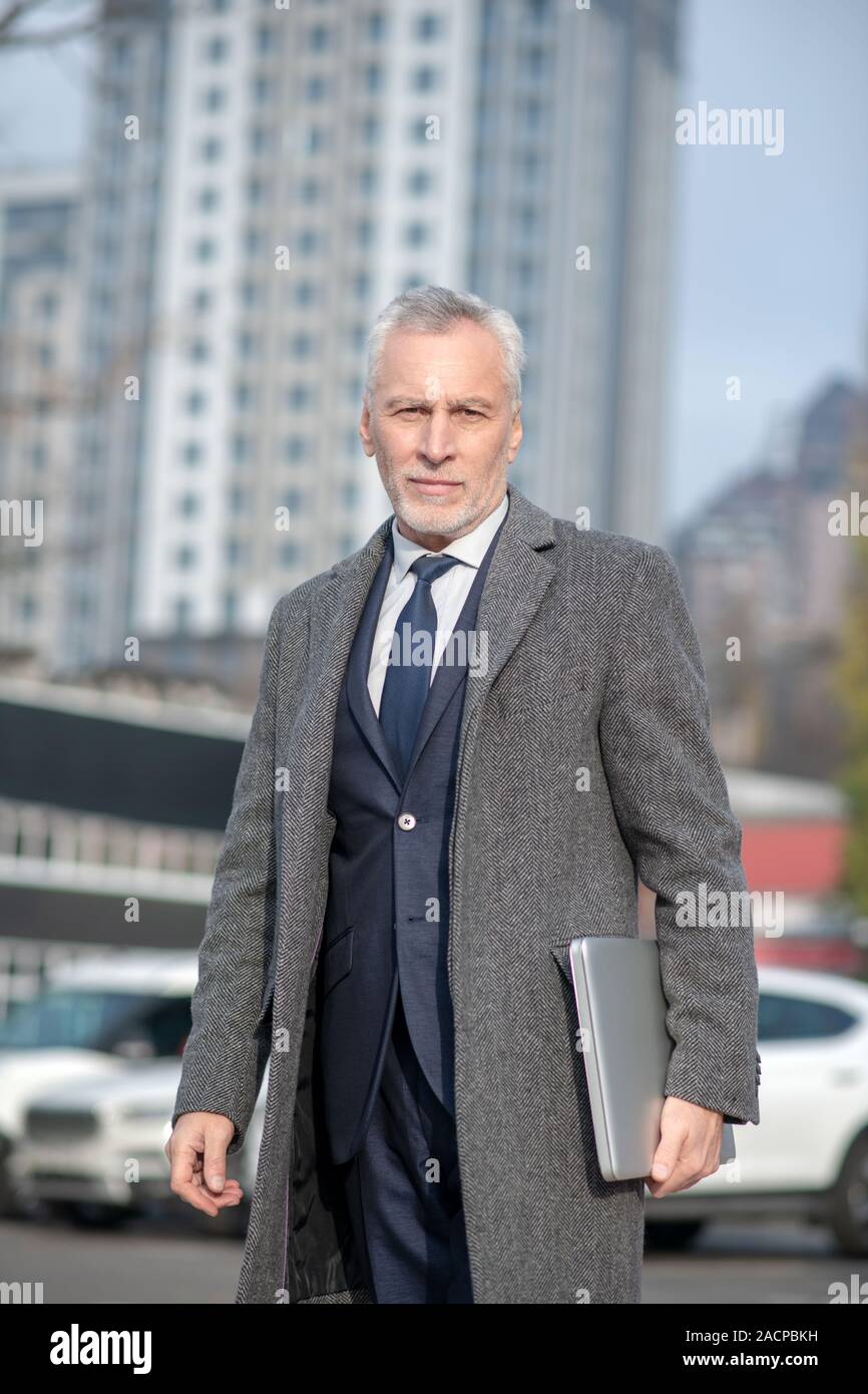 Grey coat hi-res stock photography and images - Alamy