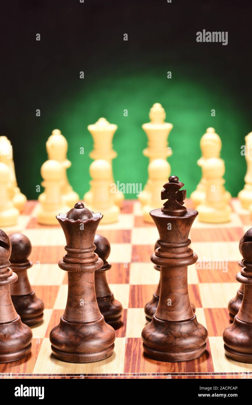 Pieces of chess game on the chessboard Stock Photo - Alamy