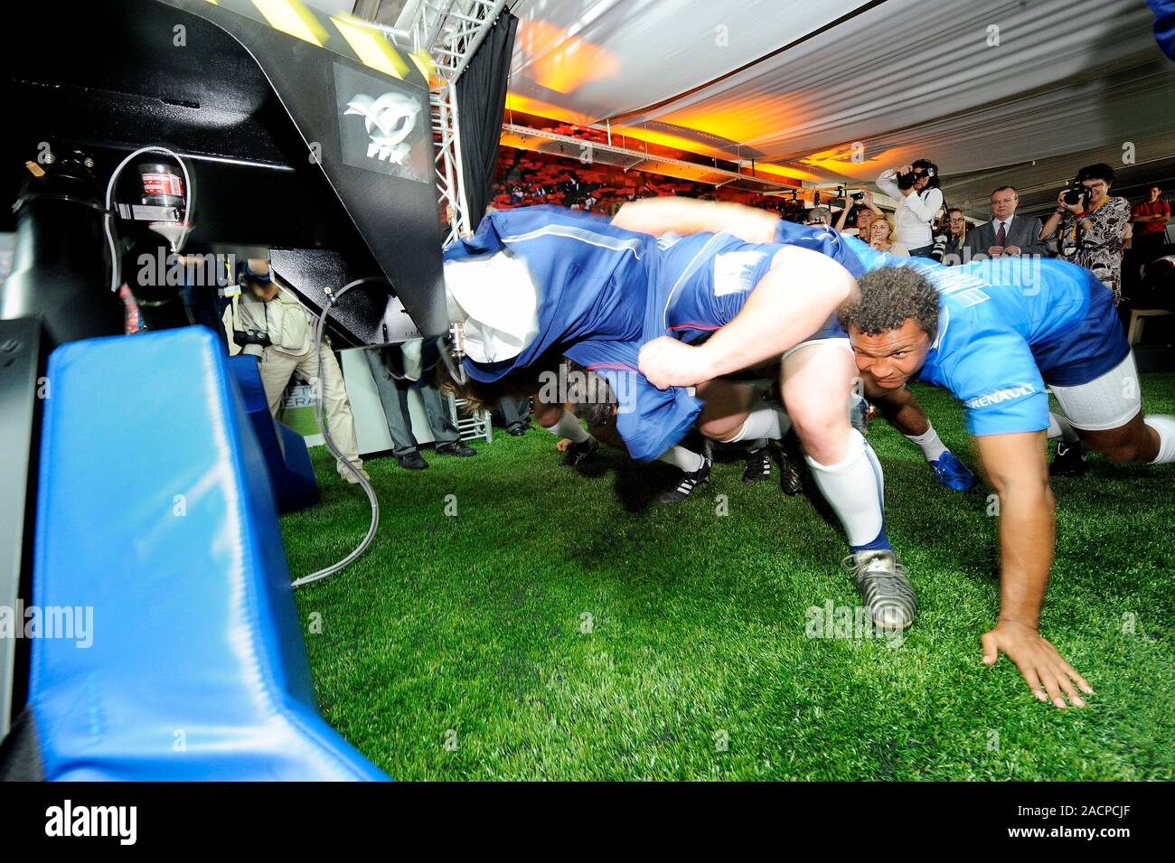 Rugby scrum simulator. French rugby team demonstrating the new M-Rex ...