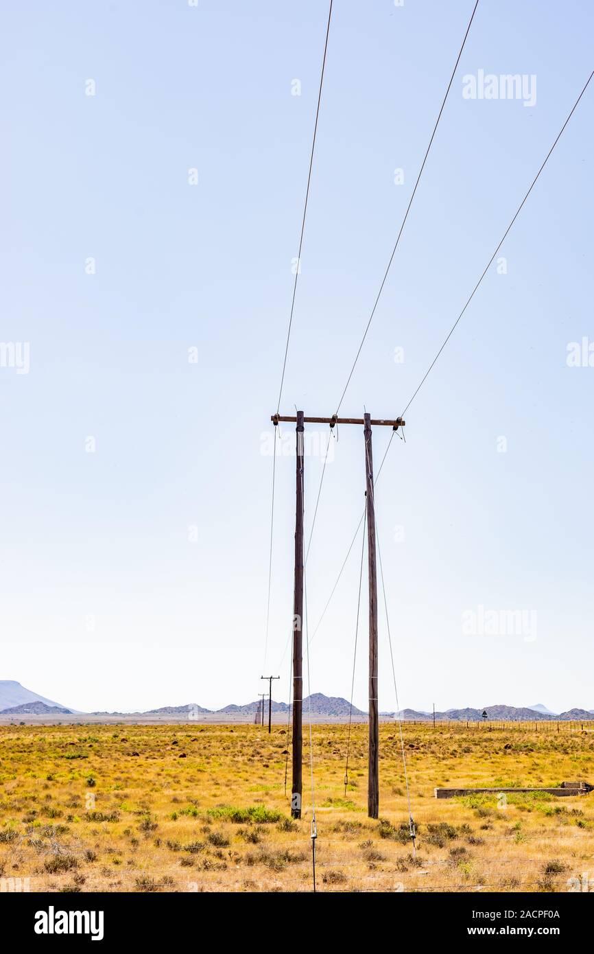 Power lines in Rural Grassland Farming Area of the Karoo Semi-desert in ...