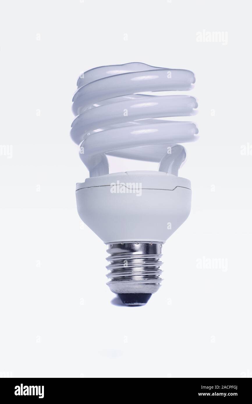 light bulb standing on a white background Stock Photo - Alamy