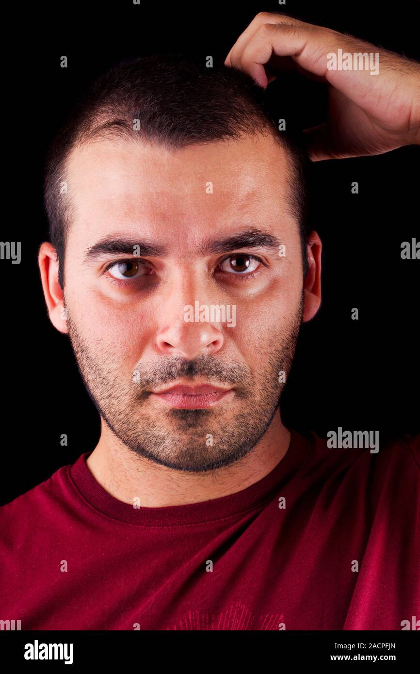 unsure male man Stock Photo - Alamy