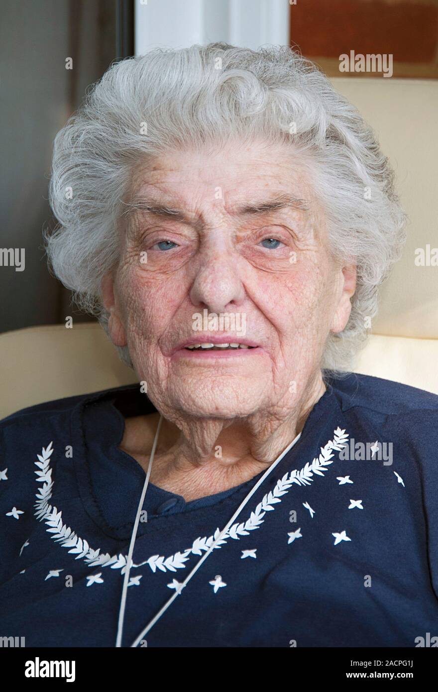 Community nursing. 84-year-old female patient in her home during a home ...