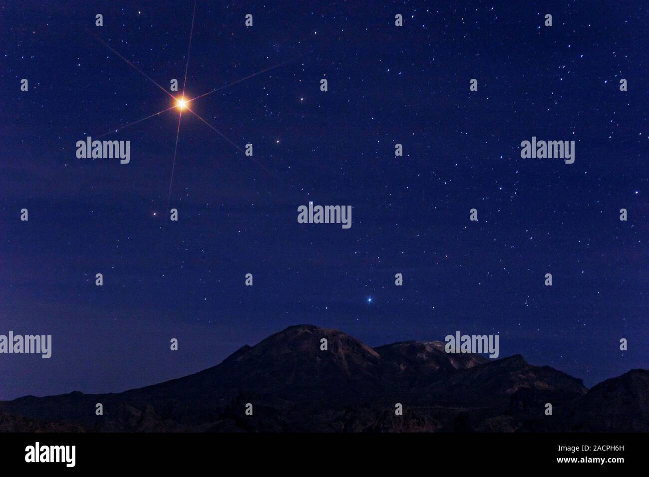 Mars over Taftan volcano. View of winter stars and Mars at it's ...