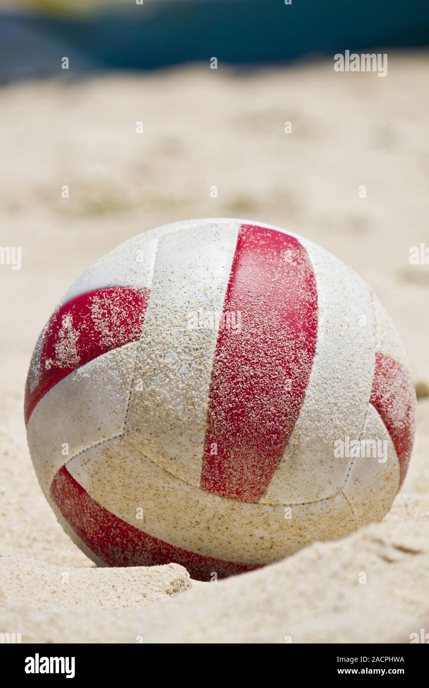 beach ball on sand Stock Photo - Alamy