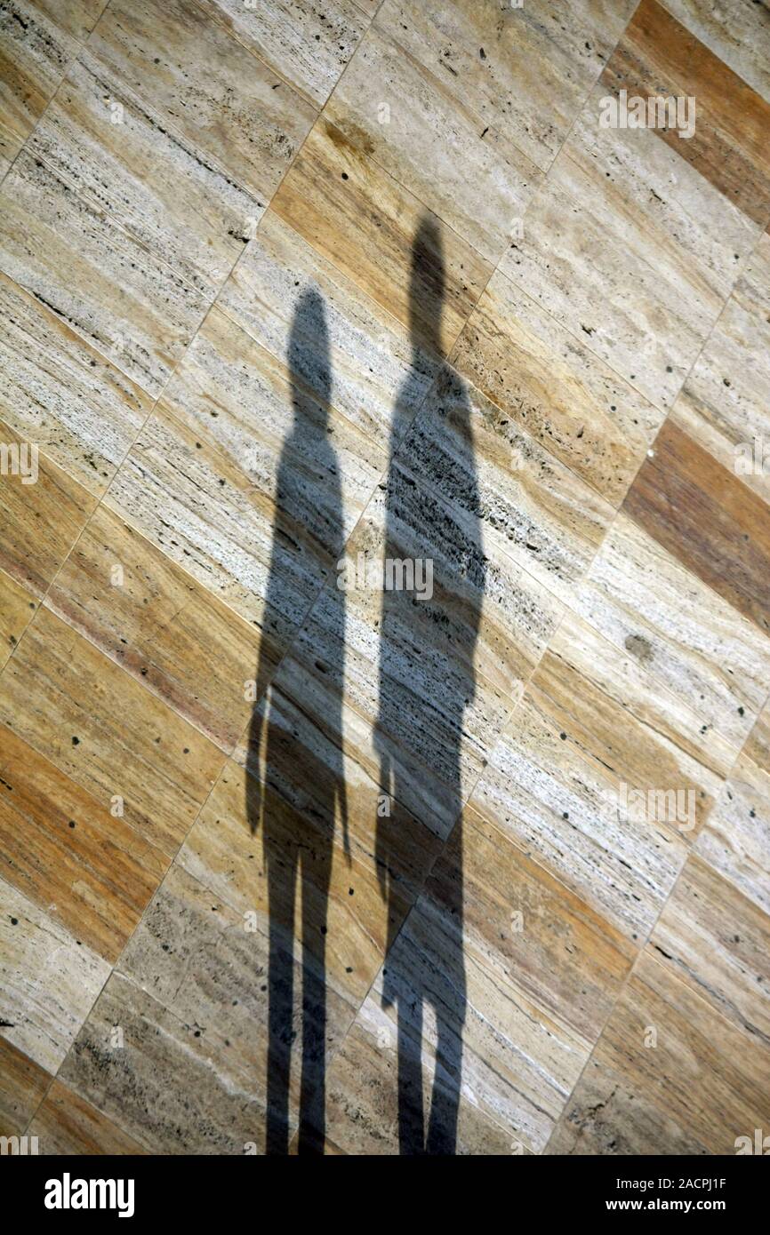 Two shadows on marble floor Stock Photo - Alamy