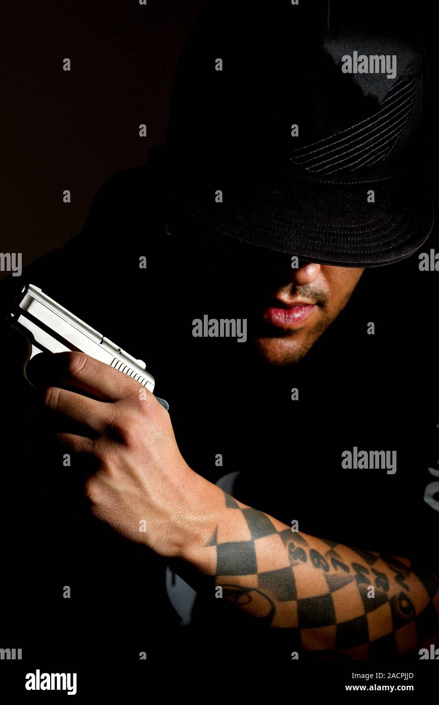 Man gun hi-res stock photography and images - Alamy
