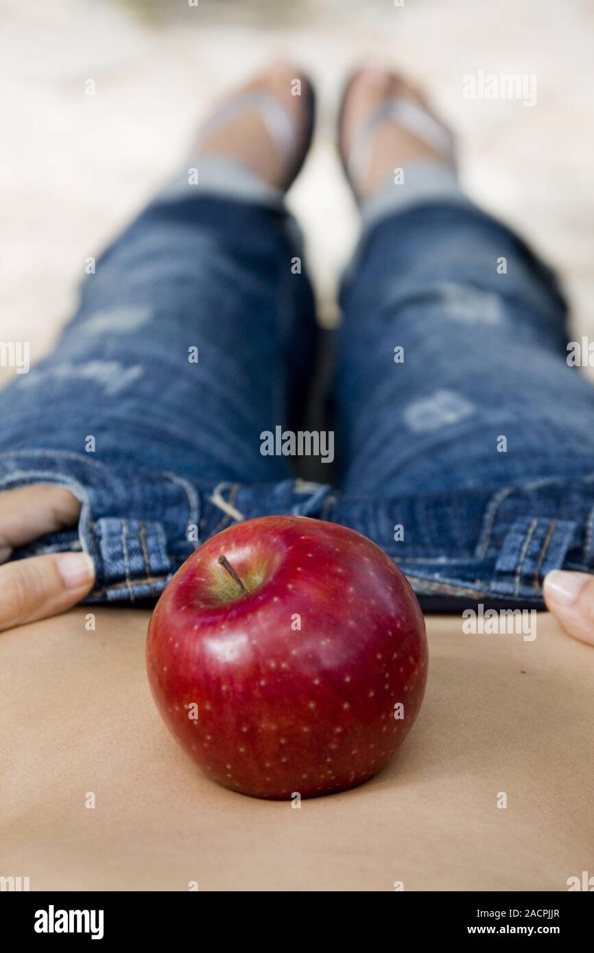 Middle of abdomen hi-res stock photography and images - Alamy