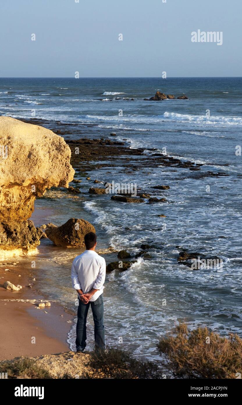Man with arms wide open Stock Photo - Alamy