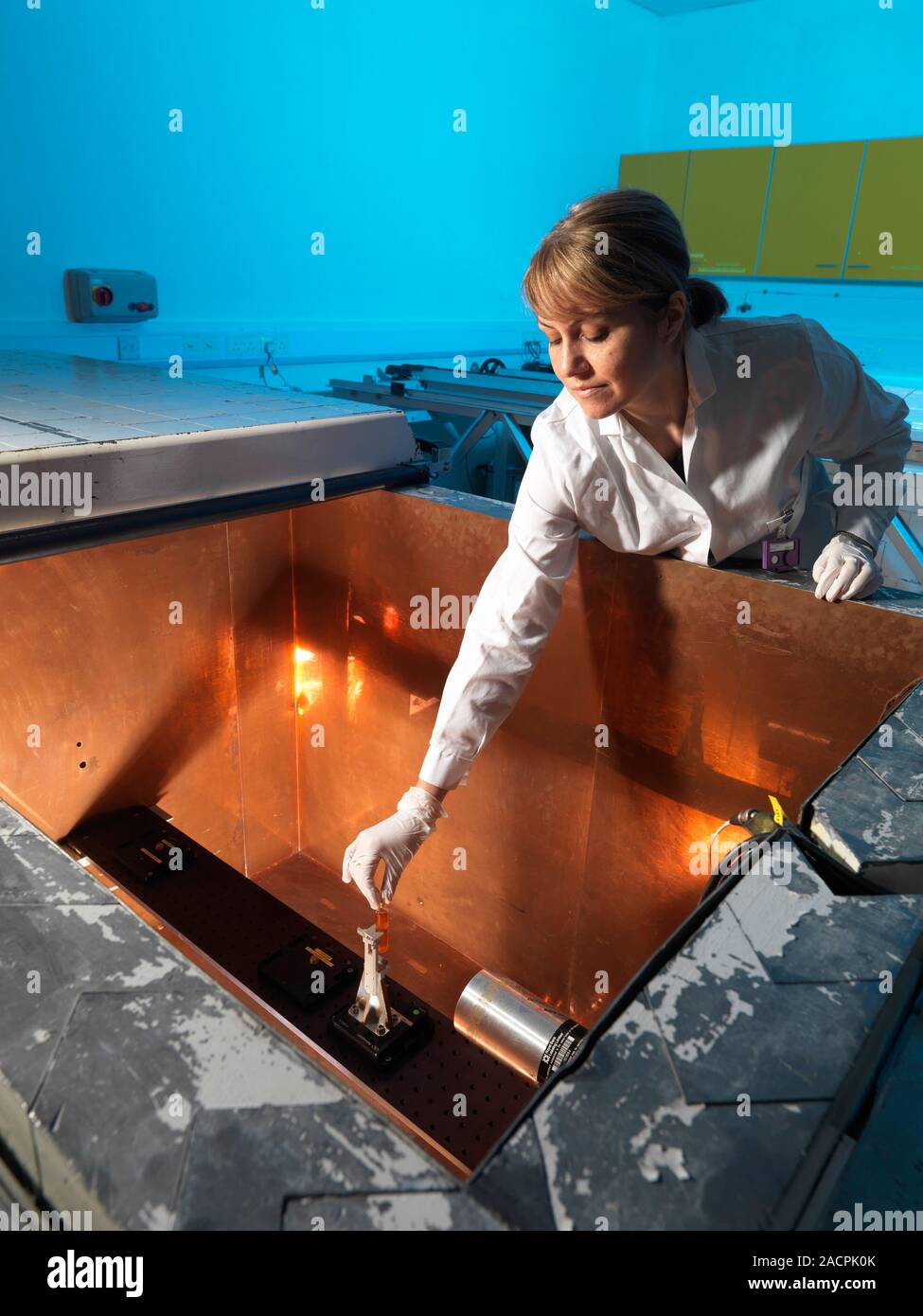 Gamma Spectroscopy Scientist Loading A Sample Into A High Resolution Gamma Spectrometer The